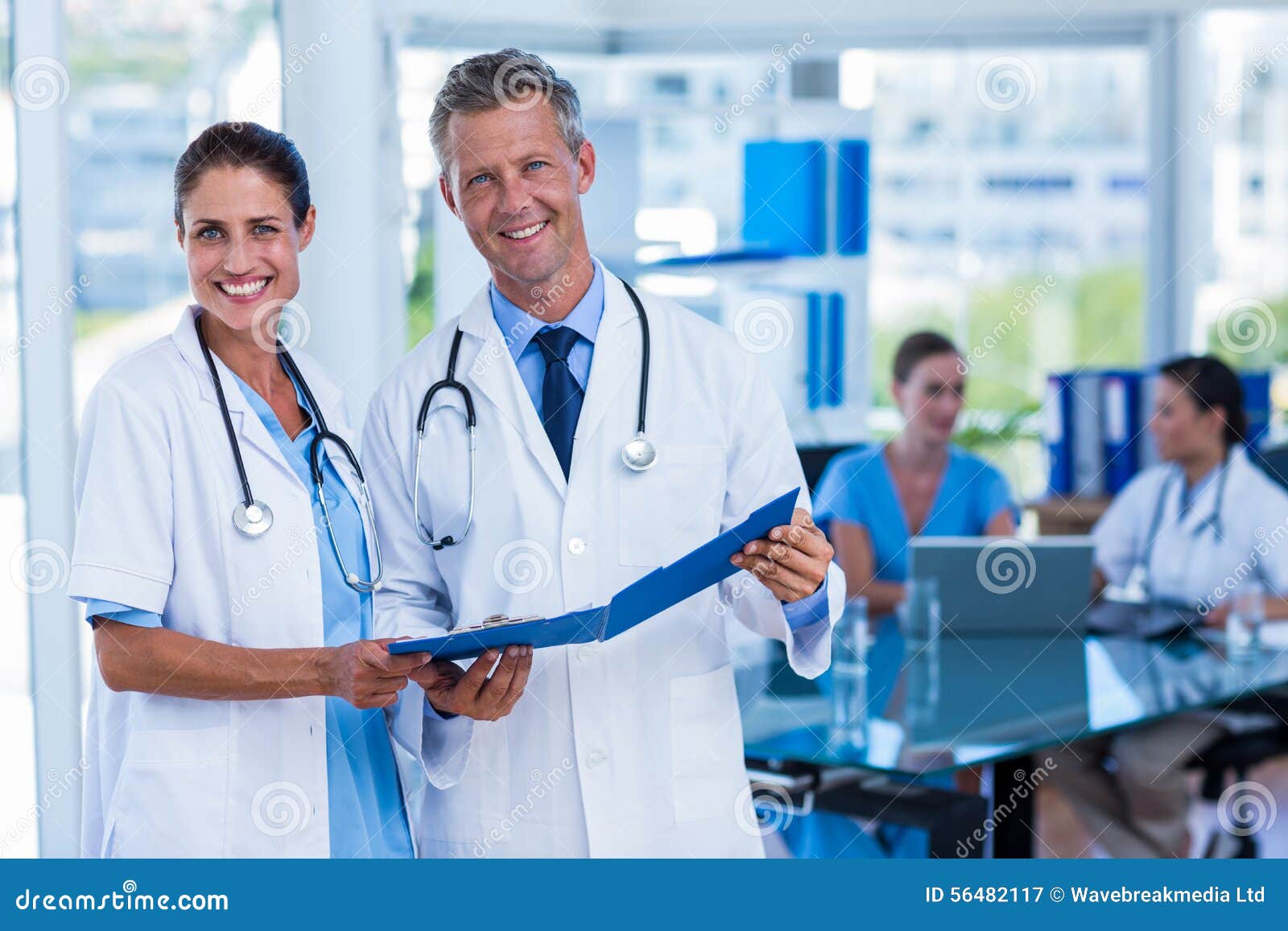 Happy Doctors Smiling at Camera Stock Image - Image of doctors ...