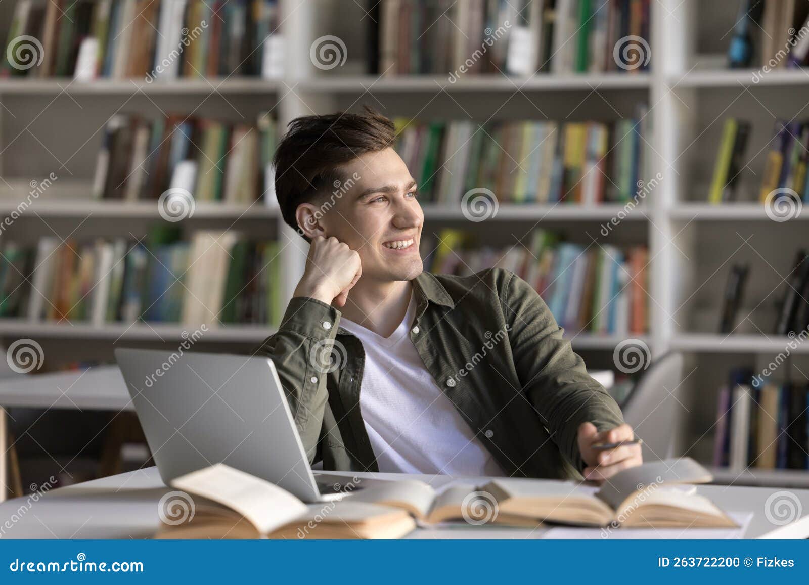 Happy Dreamy Student Guy Working on Scientific Article Stock Photo ...