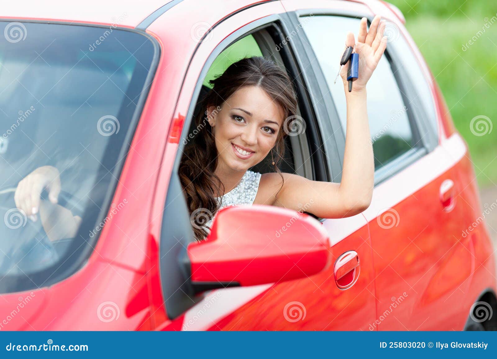 Happy driver in red car stock photo. Image of looking - 25803020