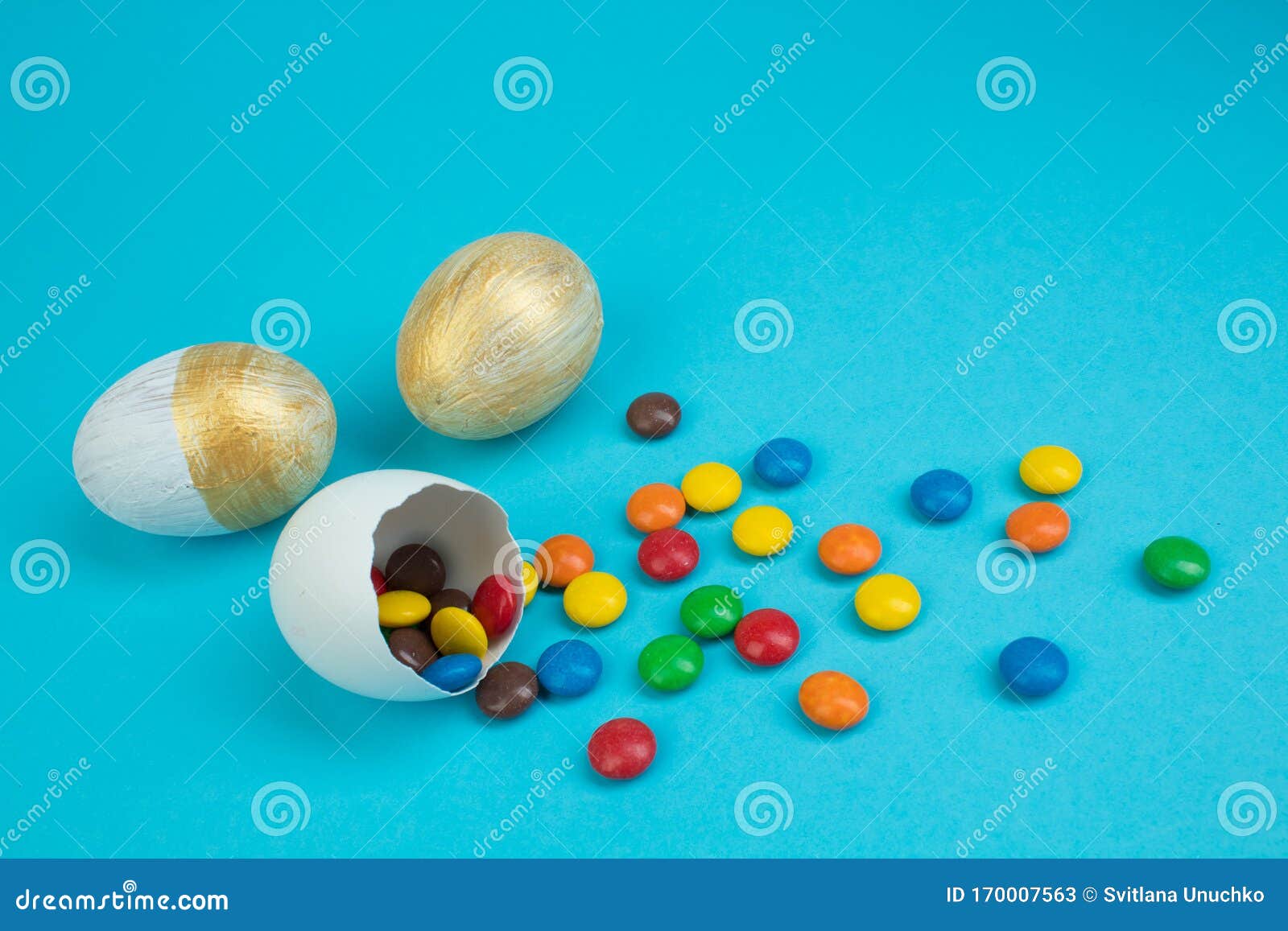 Happy Easter. Broken Easter Egg with Multi-colored Candy Decorations on ...