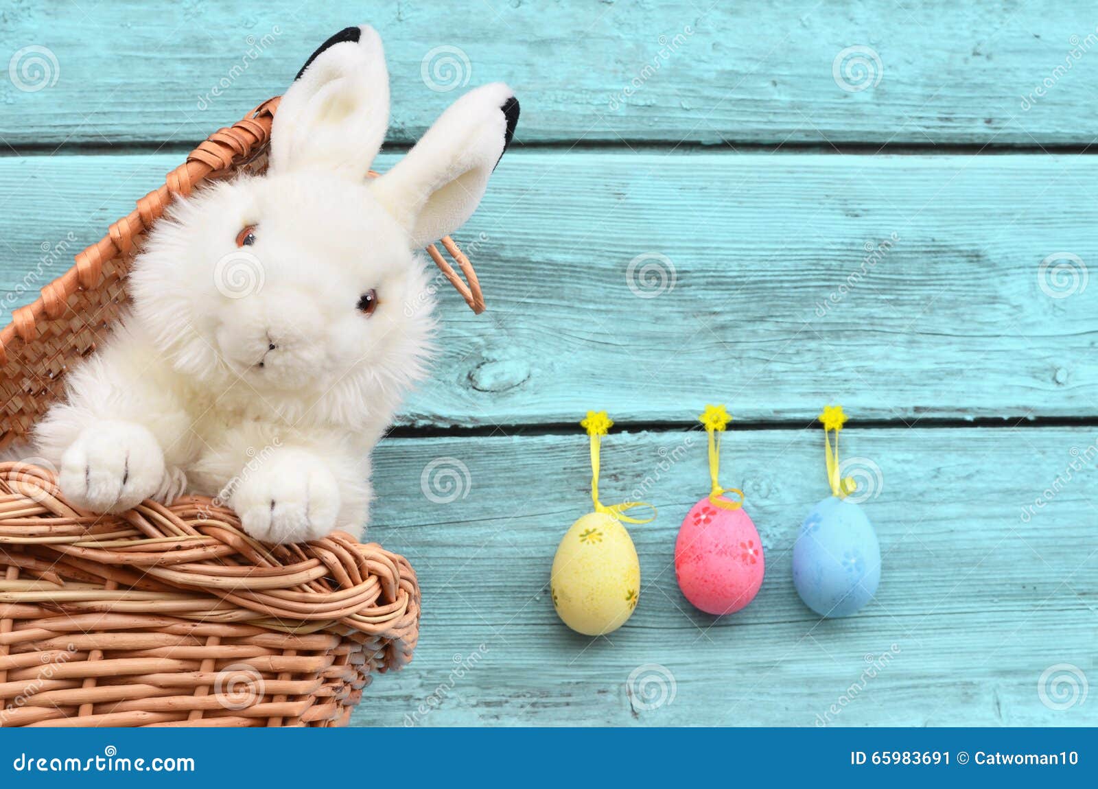 Happy Easter Bunny in Basket and Eggs on Blue Background. Stock Image ...