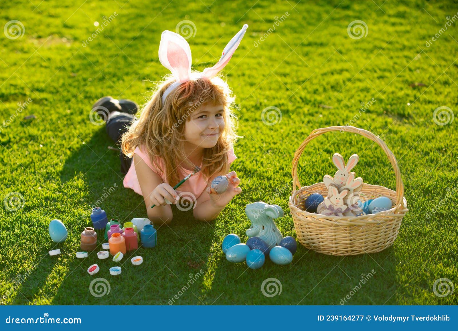 Happy Easter Bunny Child Boy. Easter Kids with Bunny Ears and on Grass ...