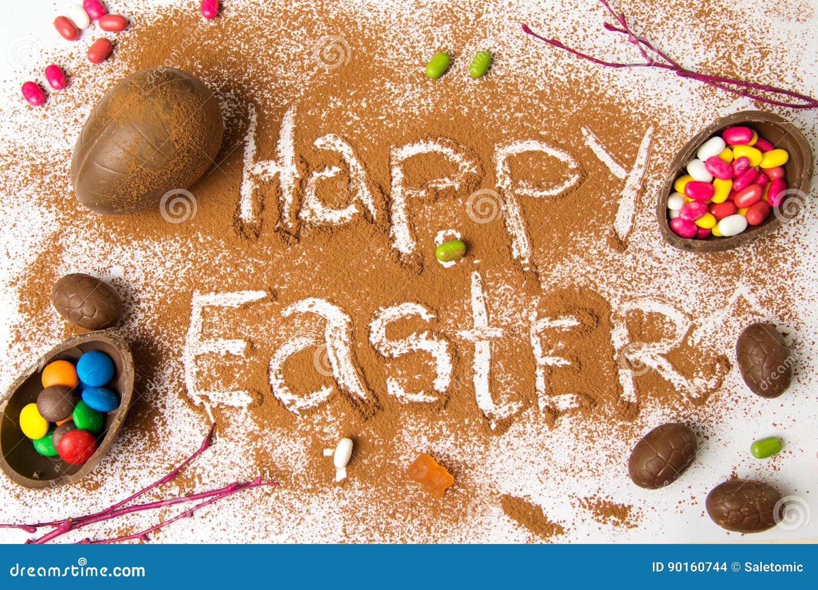 Happy Easter in Cacao Powder with Chocolate Eggs Stock Photo - Image of ...