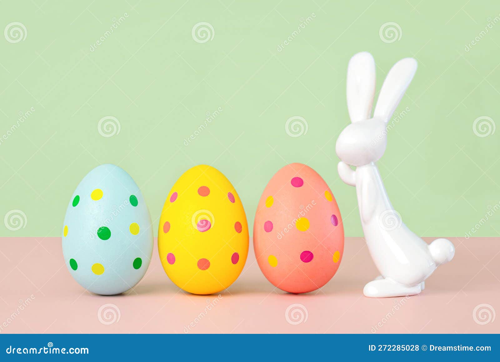 Happy Easter. Close-up of Three Easter Eggs Next To Easter Bunny with ...