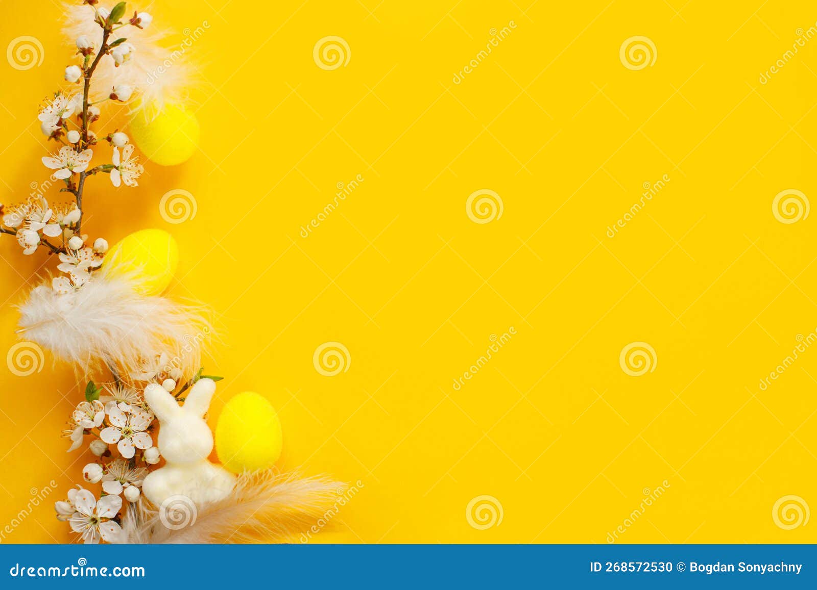 Happy Easter! Easter Flat Lay with Eggs, Bunny, Feathers and Blooming Cherry on Yellow ...