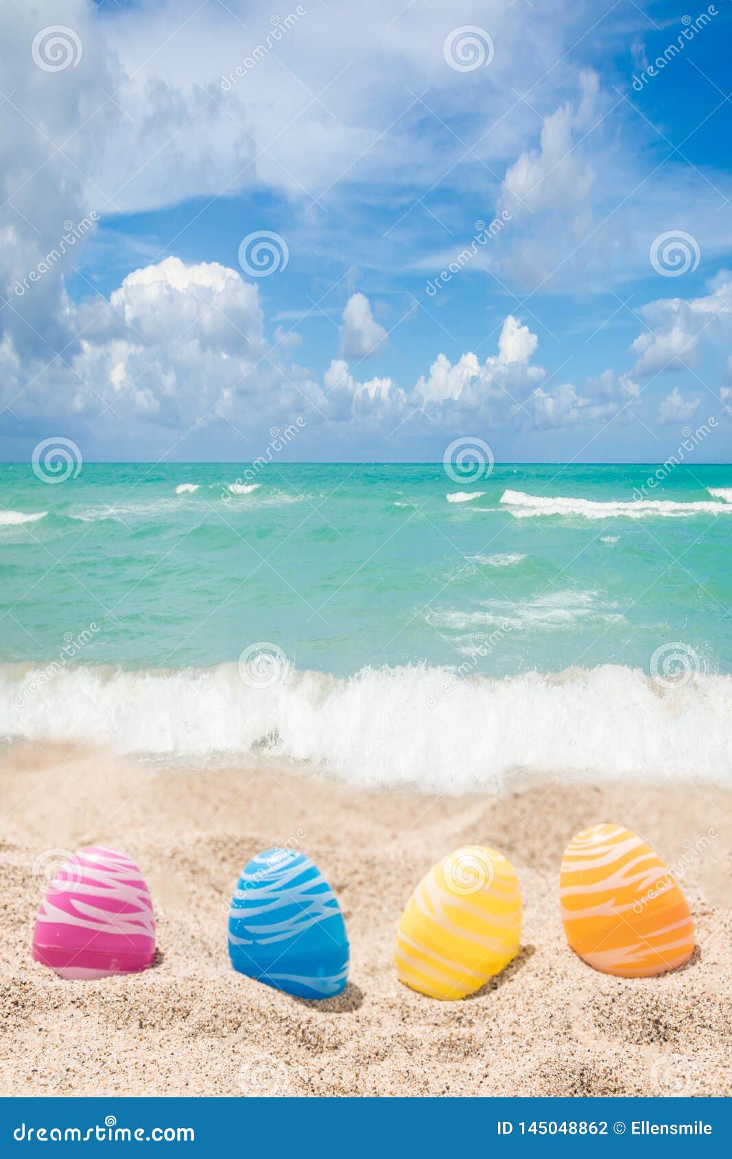 Happy Easter Lettering Background with Eggs on the Sandy Beach Stock ...