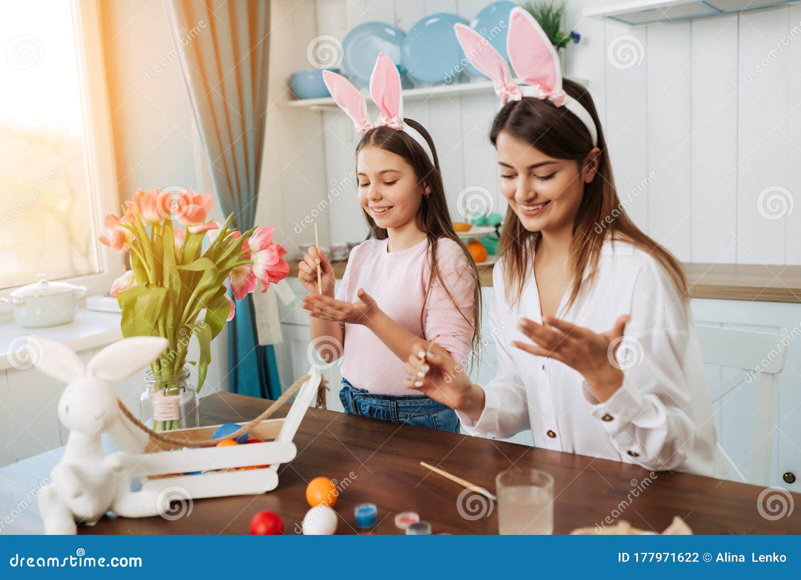 Happy Easter! Mom and Daughter are Having Fun, Painting Hands while ...