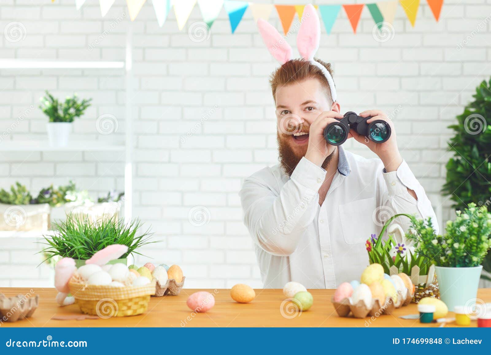 Happy Easter. a Smiling Bearded Fat Man Looks through Binoculars at a ...