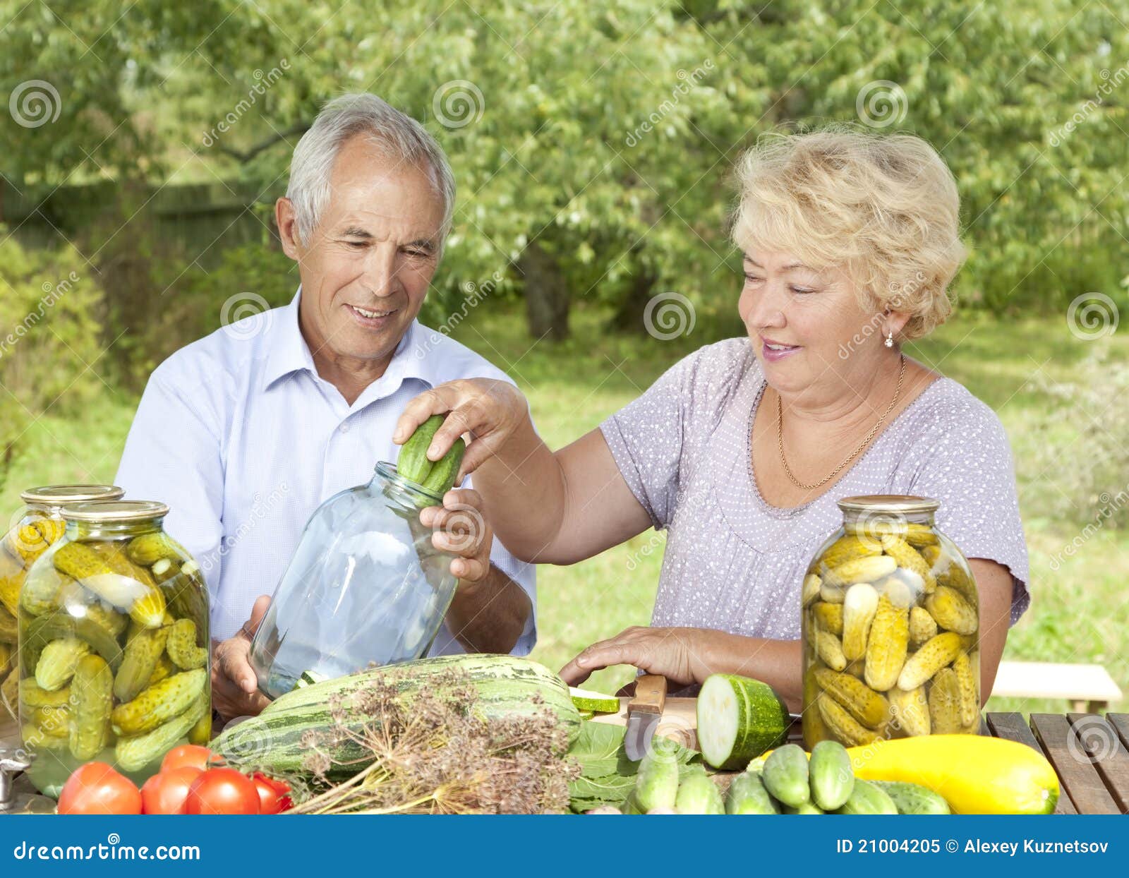 Happy elderly couple stock image. Image of gardening - 21004205
