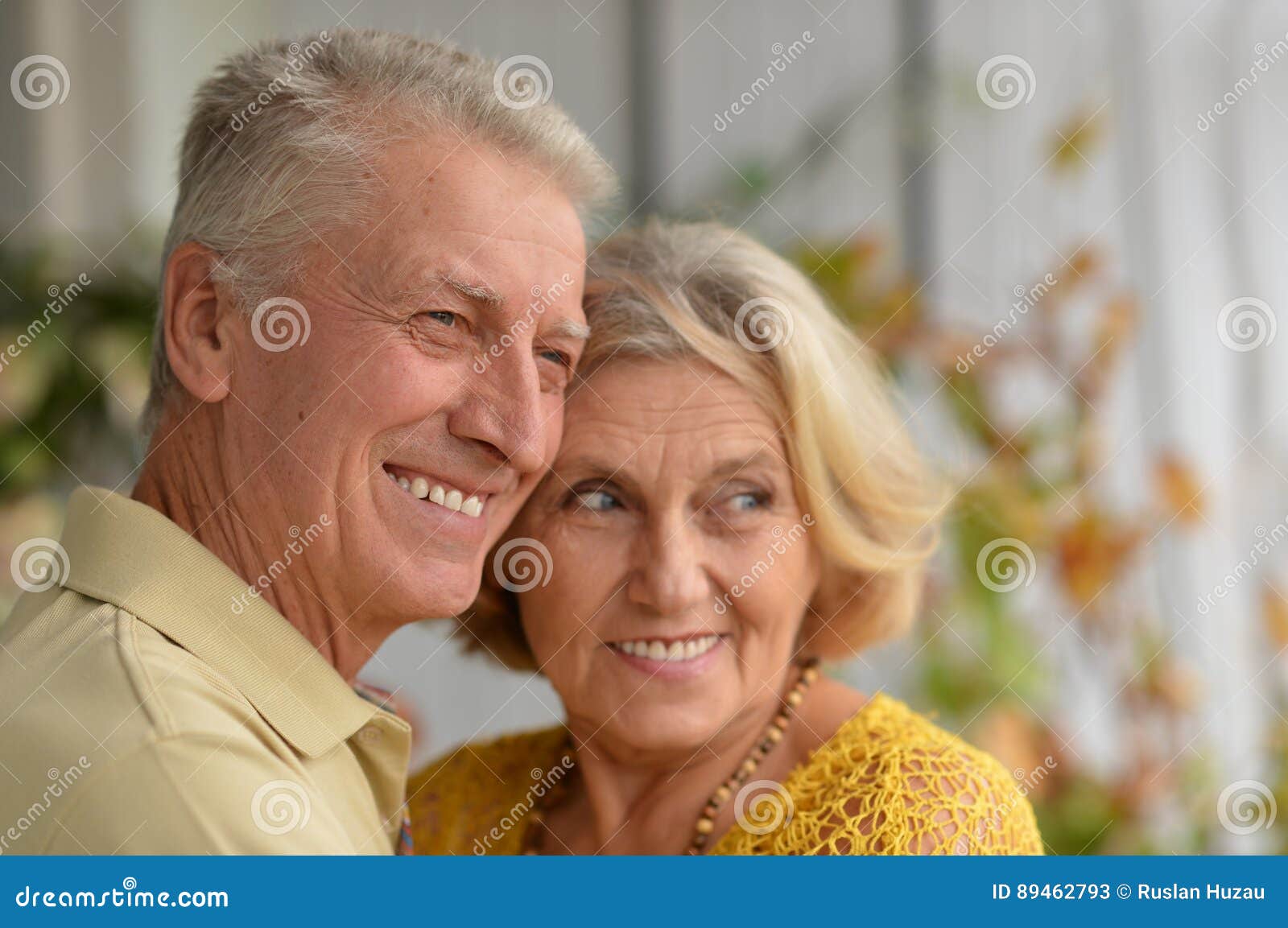 Happy Elderly Couple Embracing Stock Image - Image of male, husband ...