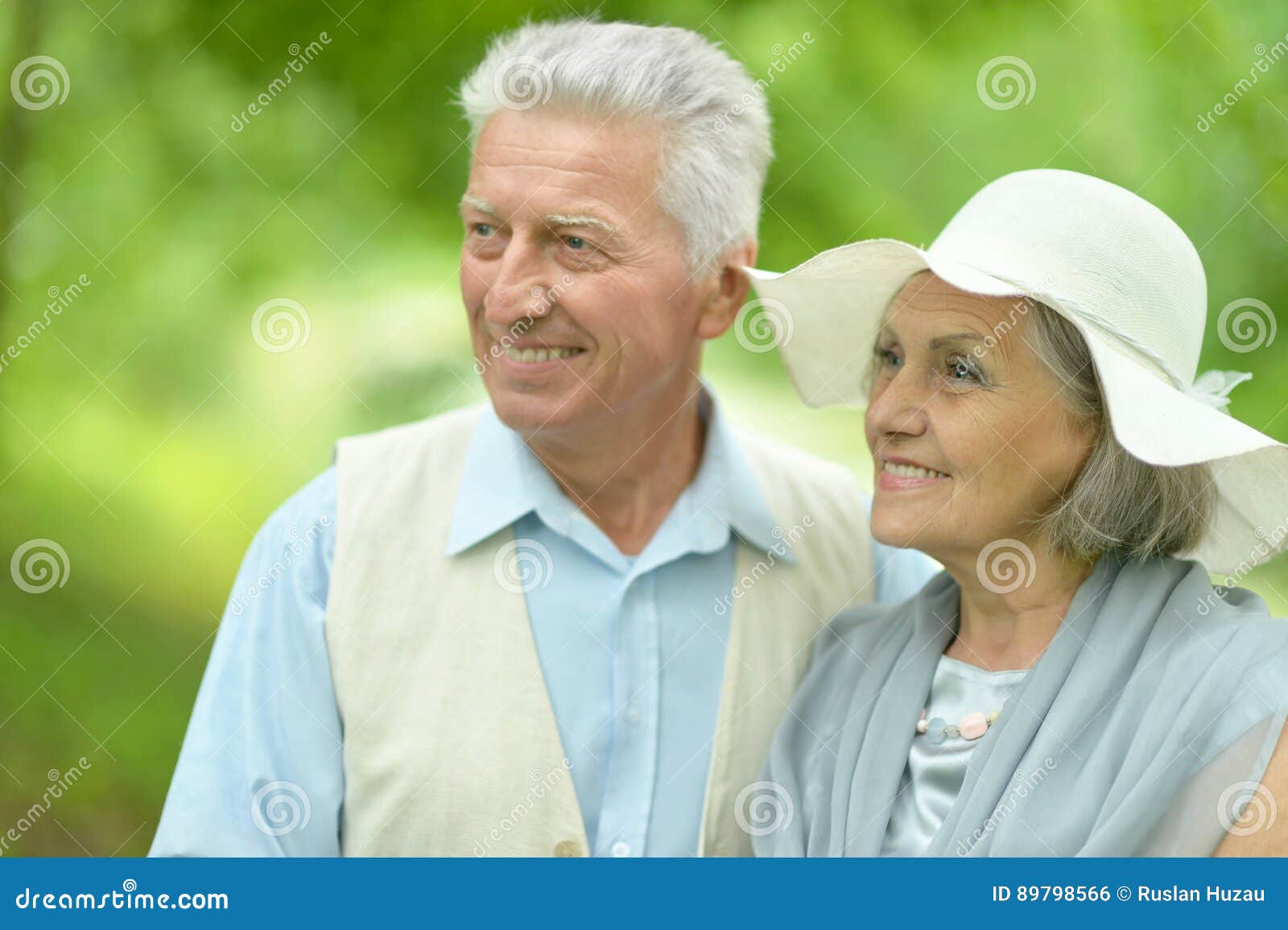 Happy Elderly Couple Embracing Stock Photo - Image of retired, female ...