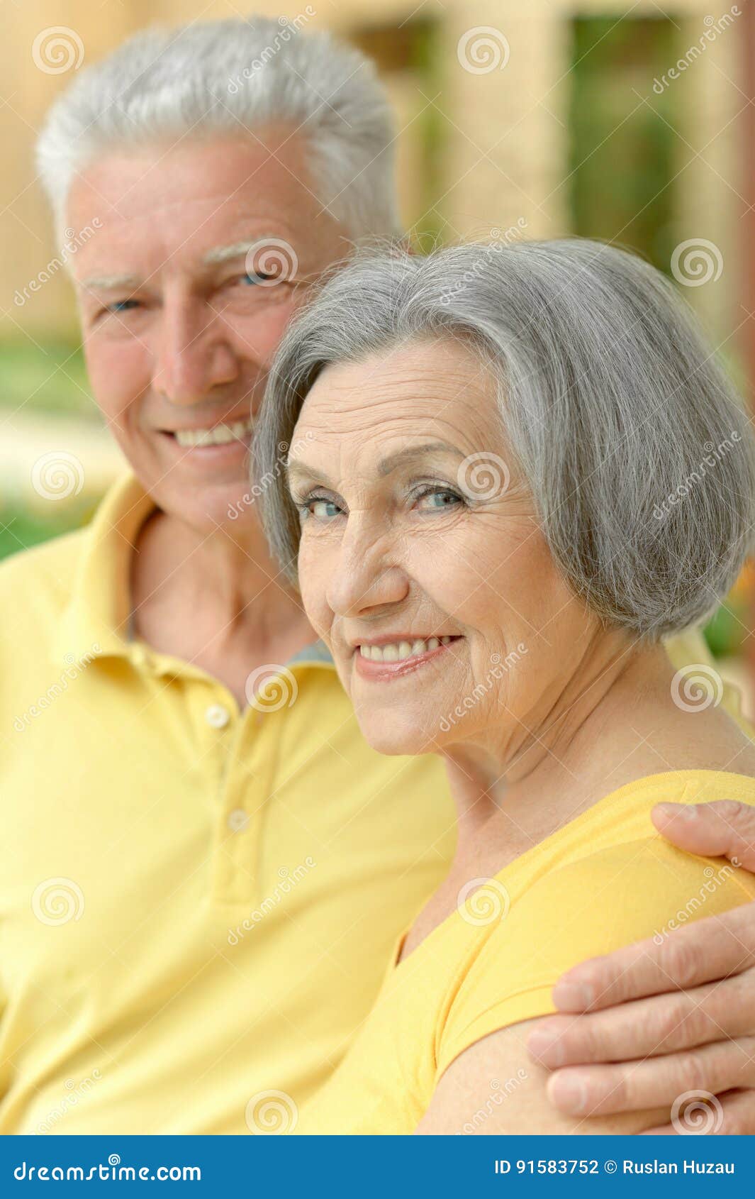 Happy Elderly Couple Embracing Stock Photo - Image of embrace ...