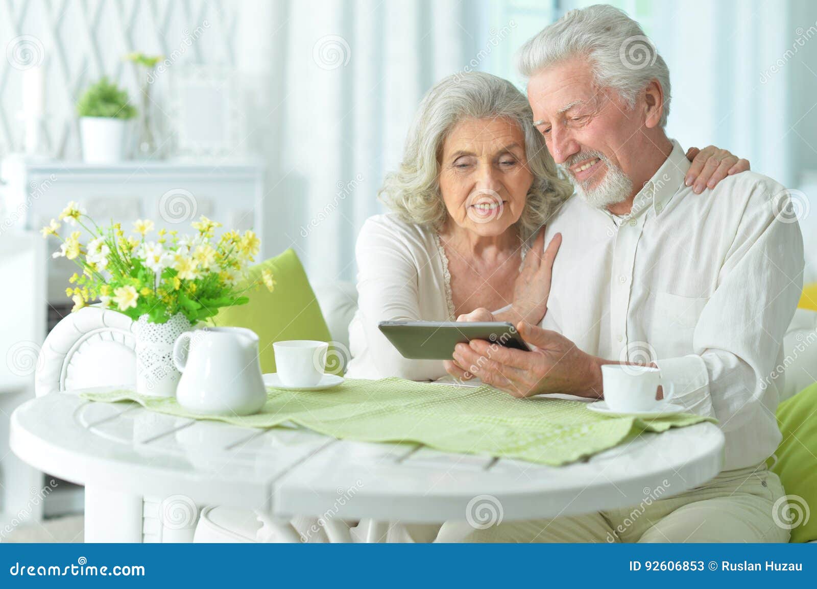 Happy Elderly Couple Using a Tablet Computer Stock Image - Image of ...