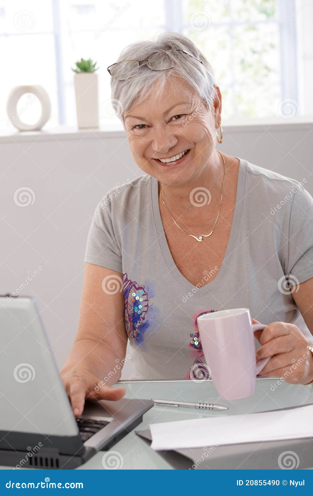 Happy Elderly Woman with Laptop Stock Photo - Image of contact, color ...
