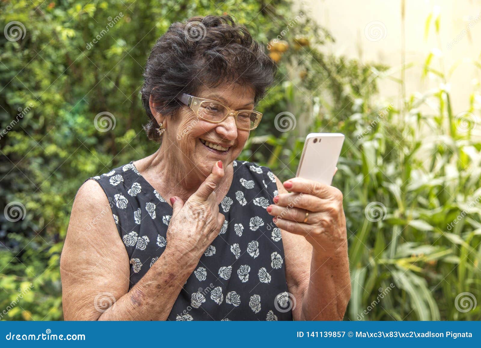 Happy Elderly Woman Using Cellphone Stock Image - Image of portrait ...