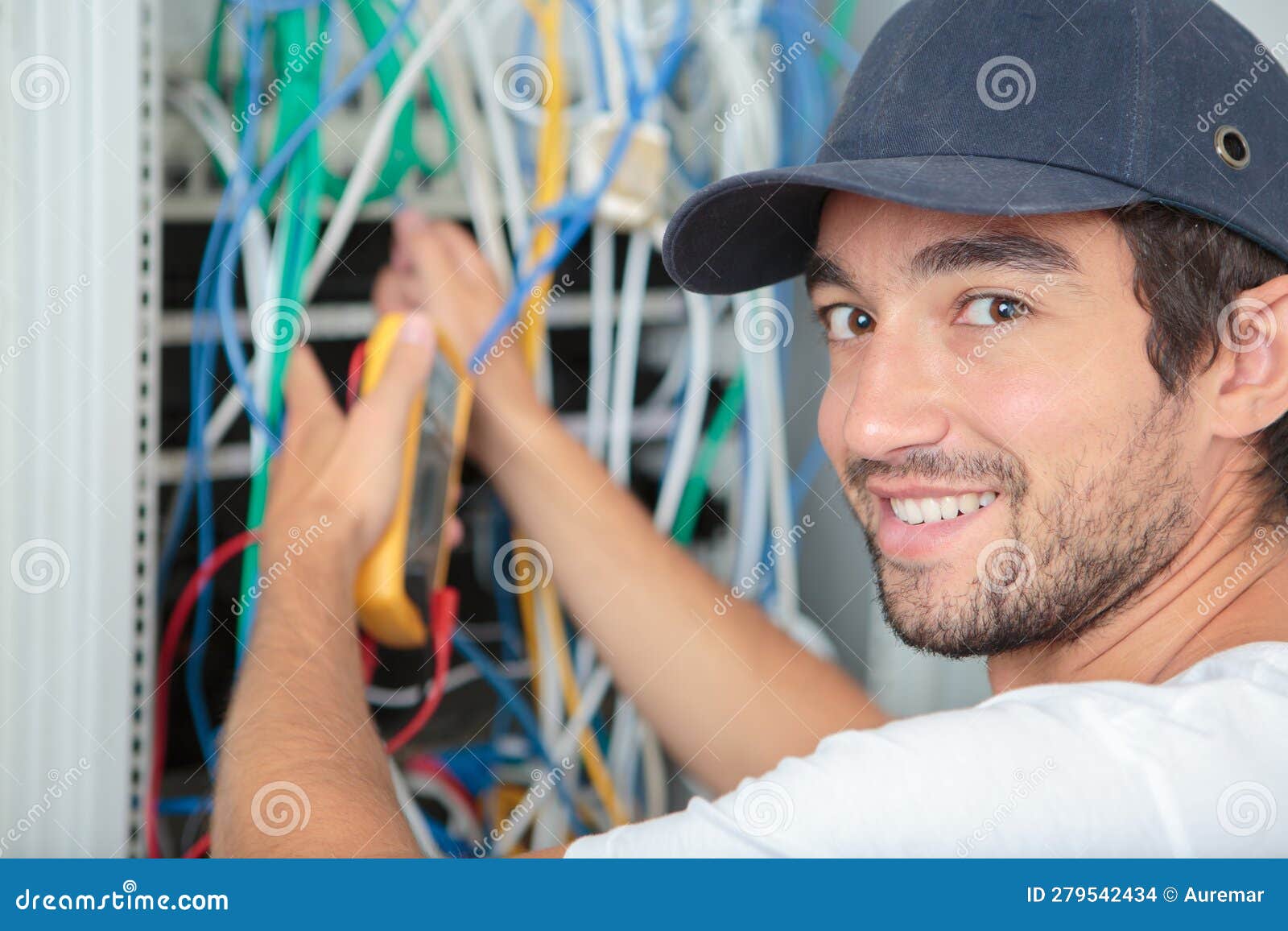 Happy electrician at work stock photo. Image of ampers - 279542434