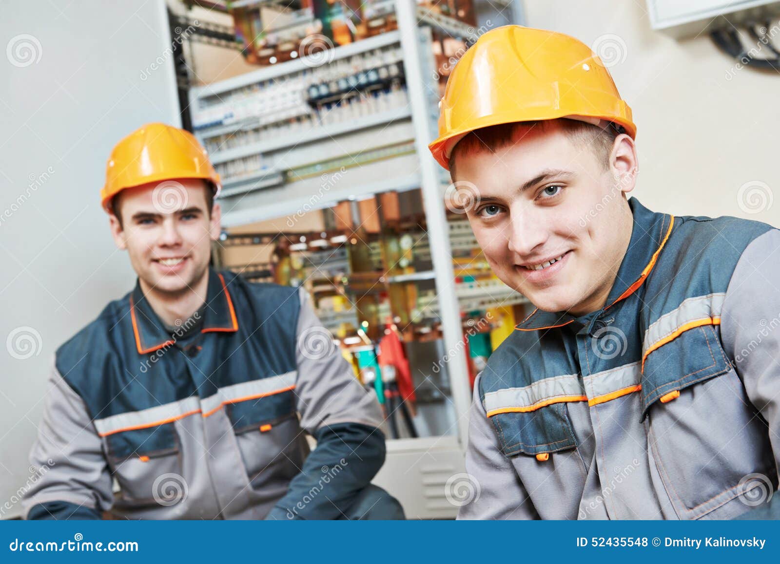 Happy electrician workers stock photo. Image of builder - 52435548