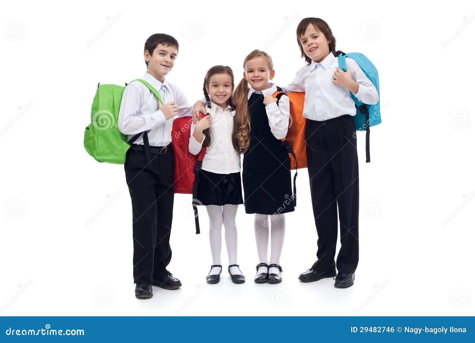 Happy Elementary School Girl Student In Eyeglasses Sitting At Desk And ...