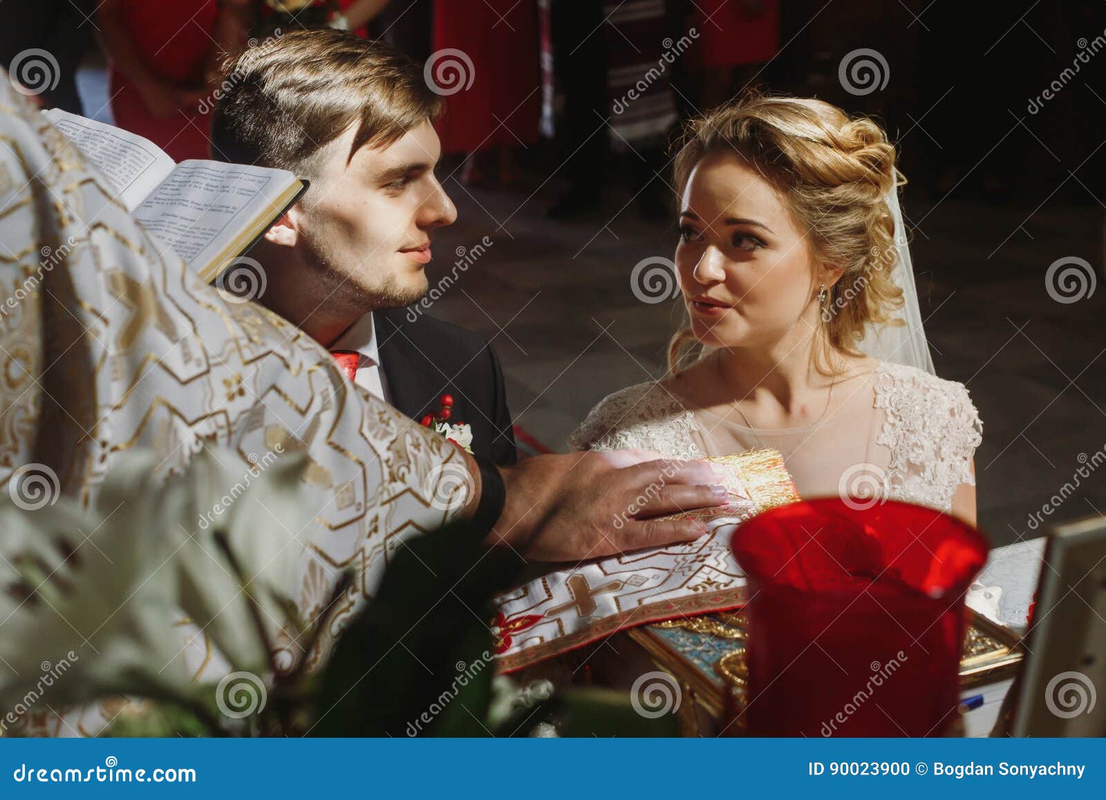 Happy Emotional Bride And Groom Give Vows During Wedding Ceremony In