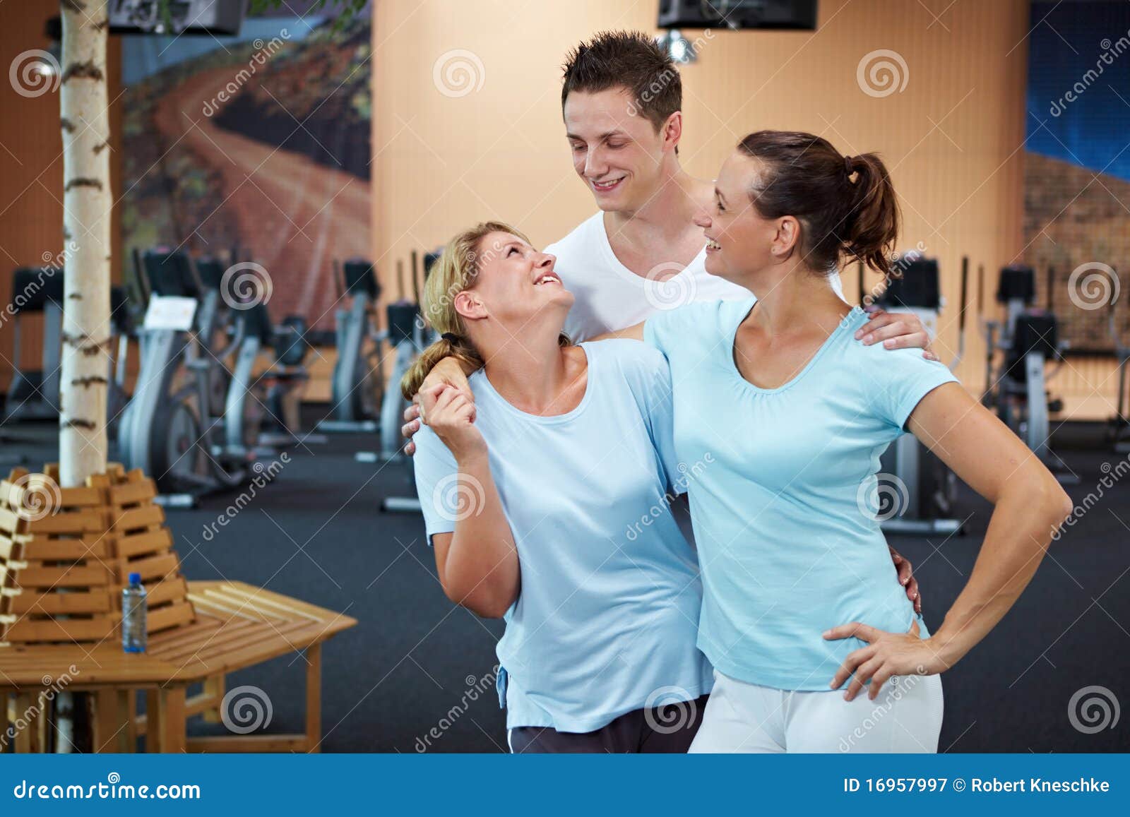 Happy employees in gym stock image. Image of device, sporty - 16957997