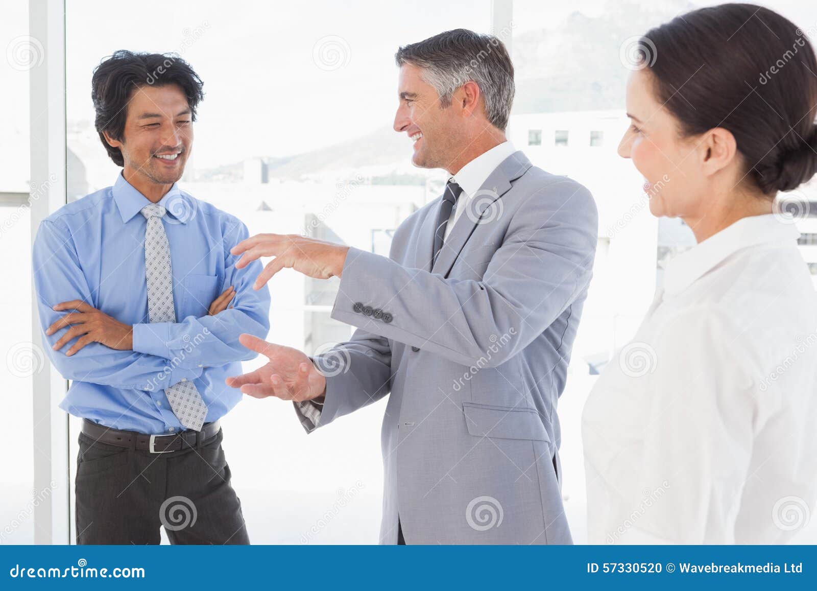Happy Employees Having a Discussion Stock Photo - Image of ...