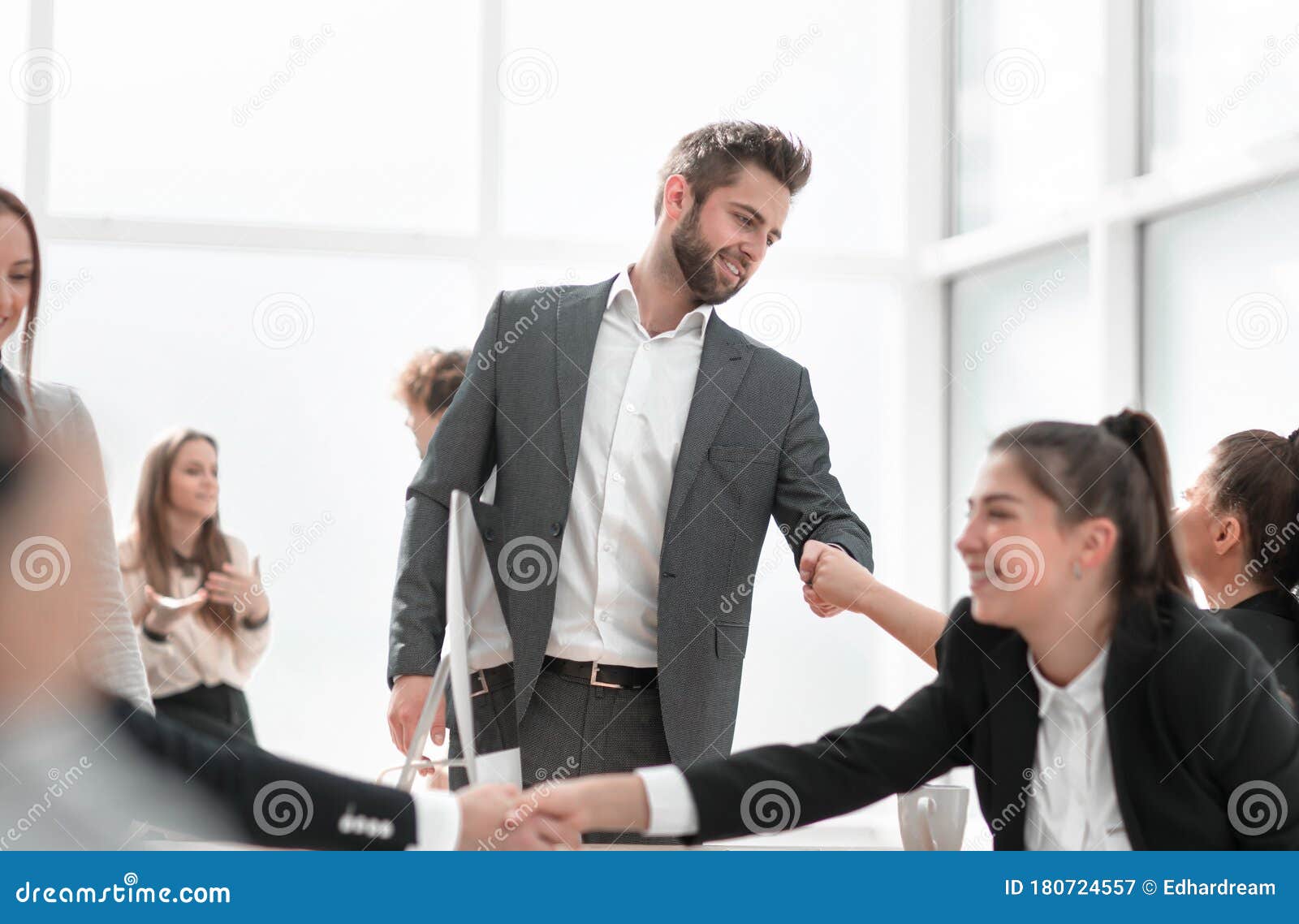 Happy Employees Shaking Hands Over the Desk. Stock Image - Image of ...