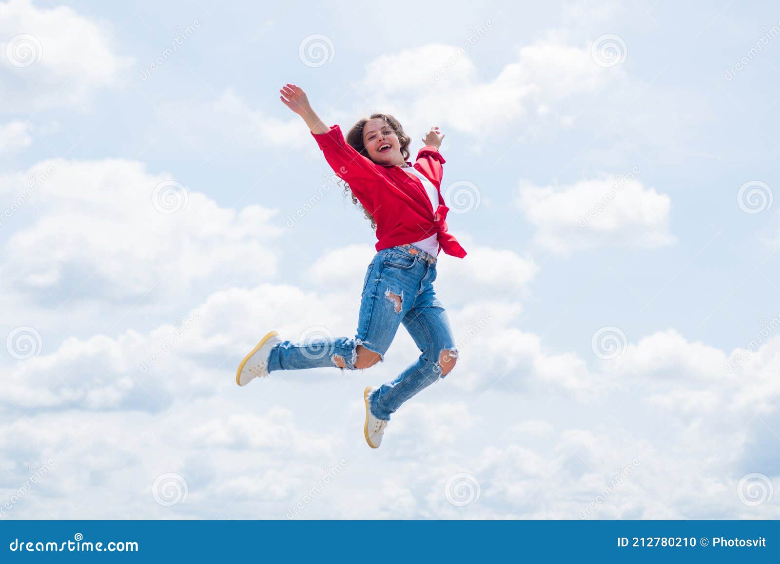 Happy Energetic Kid Feeling Free and Jumping High, Freedom Stock Photo ...