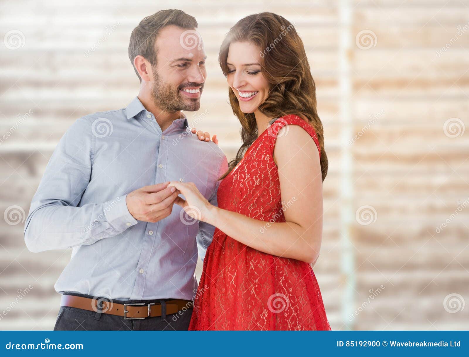 Happy Engaged Couple Looking at Engagement Ring Stock Photo - Image of ...