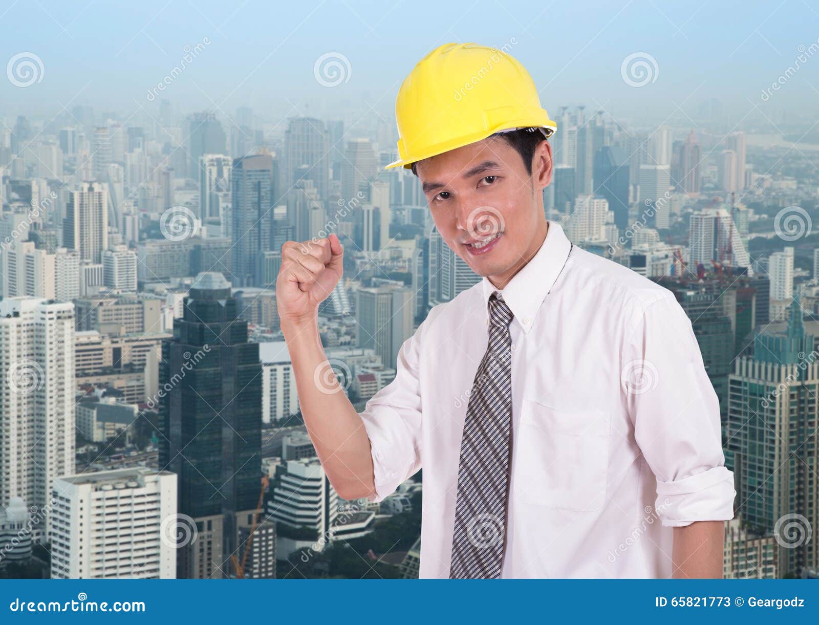 Happy Engineer with Arm Raised, Concept of Successful, City Back Stock ...