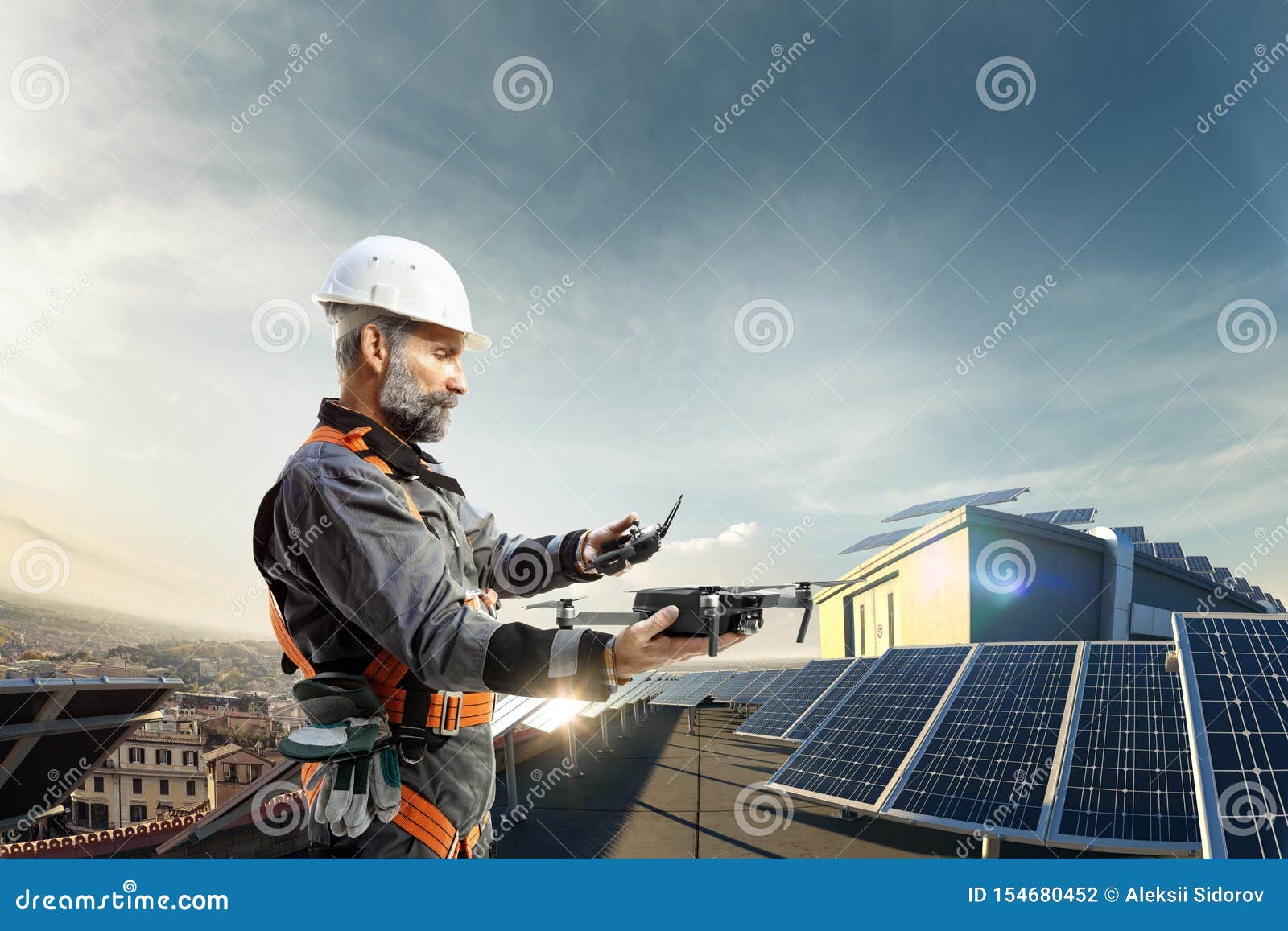 Happy Engineer Using Drone for Cheking Solar Station. in Roof Stock ...