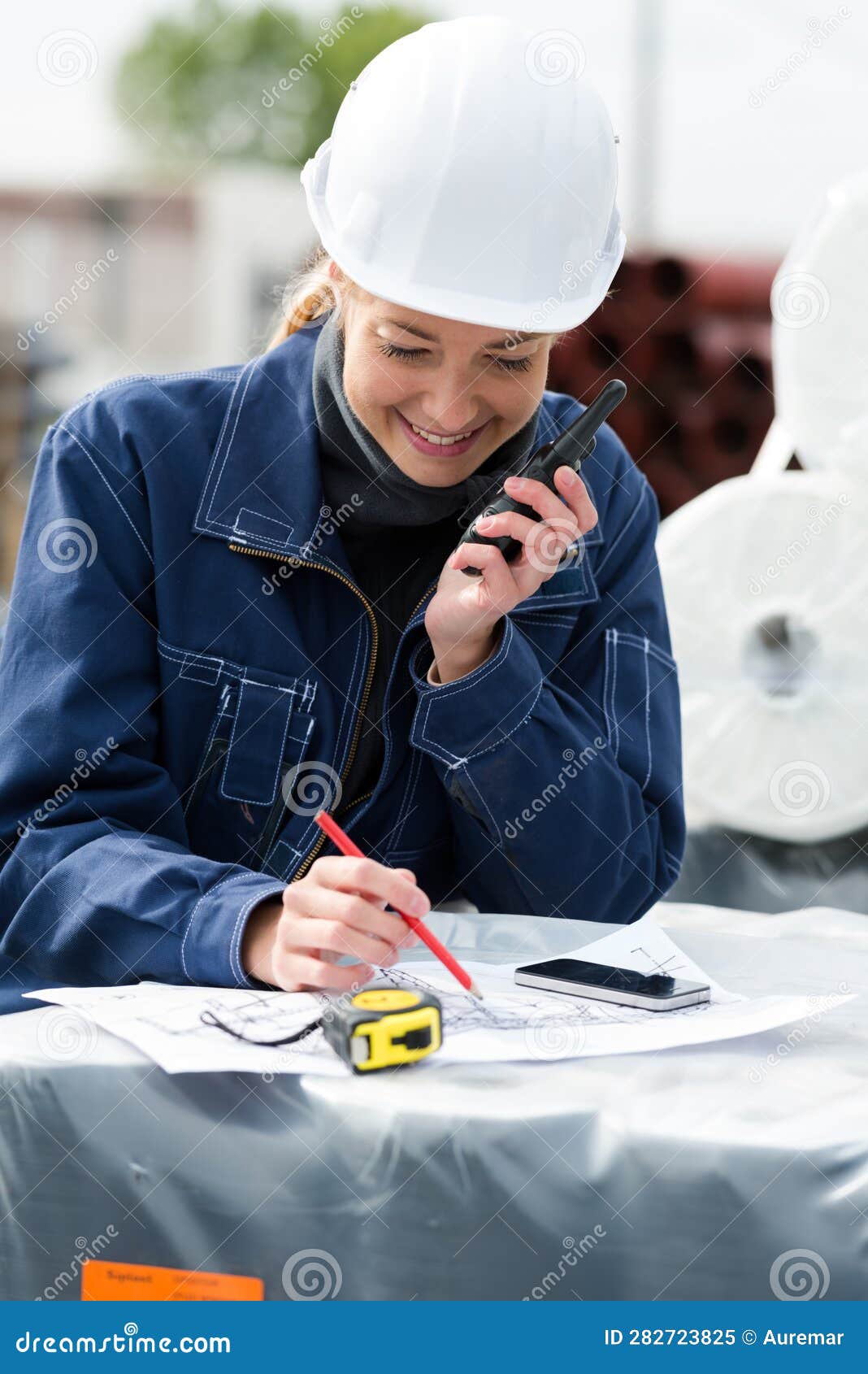 Happy Engineer Woman Using Radio Communication Outdoors Stock Image ...