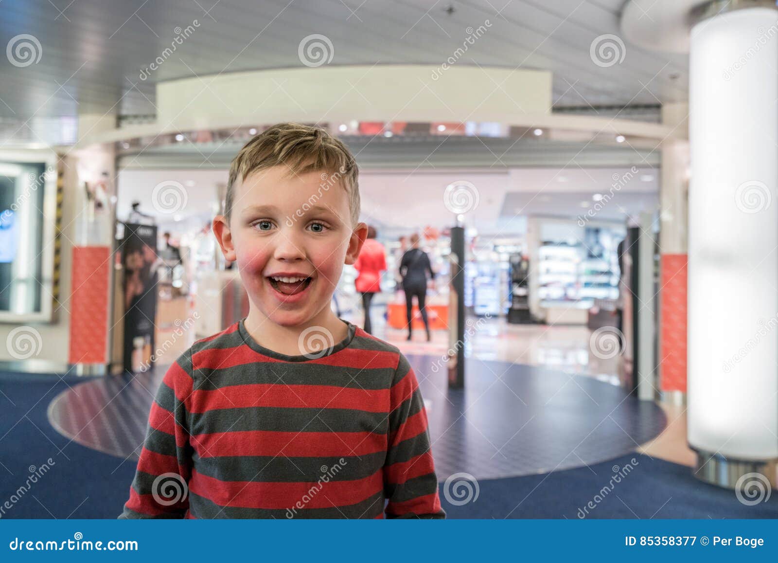 Happy and Excited Boy in Front of a Store Eager To Go in Shopping ...