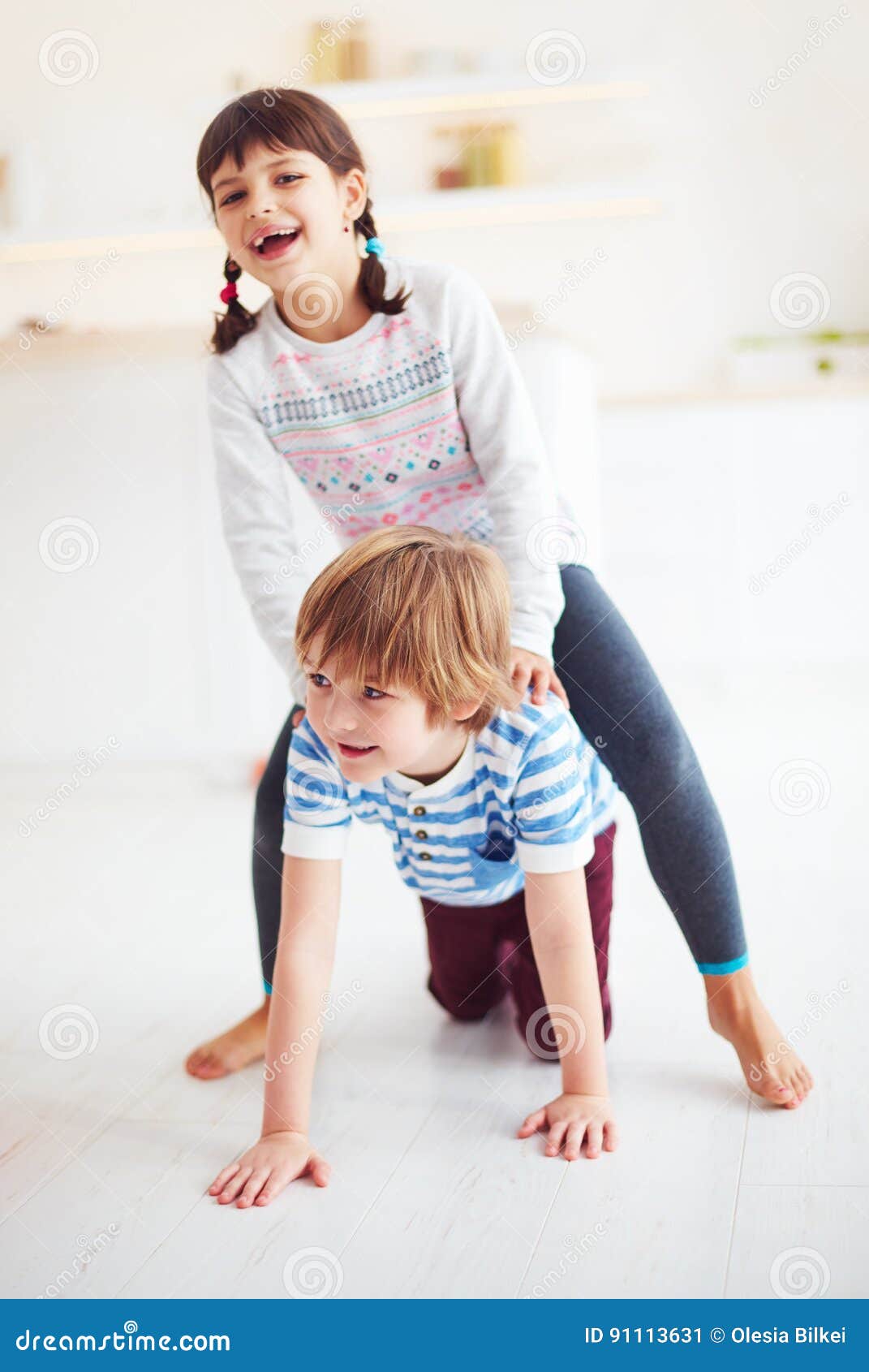 Happy Excited Kids Having Fun , Riding on the Back at Home Stock Image ...