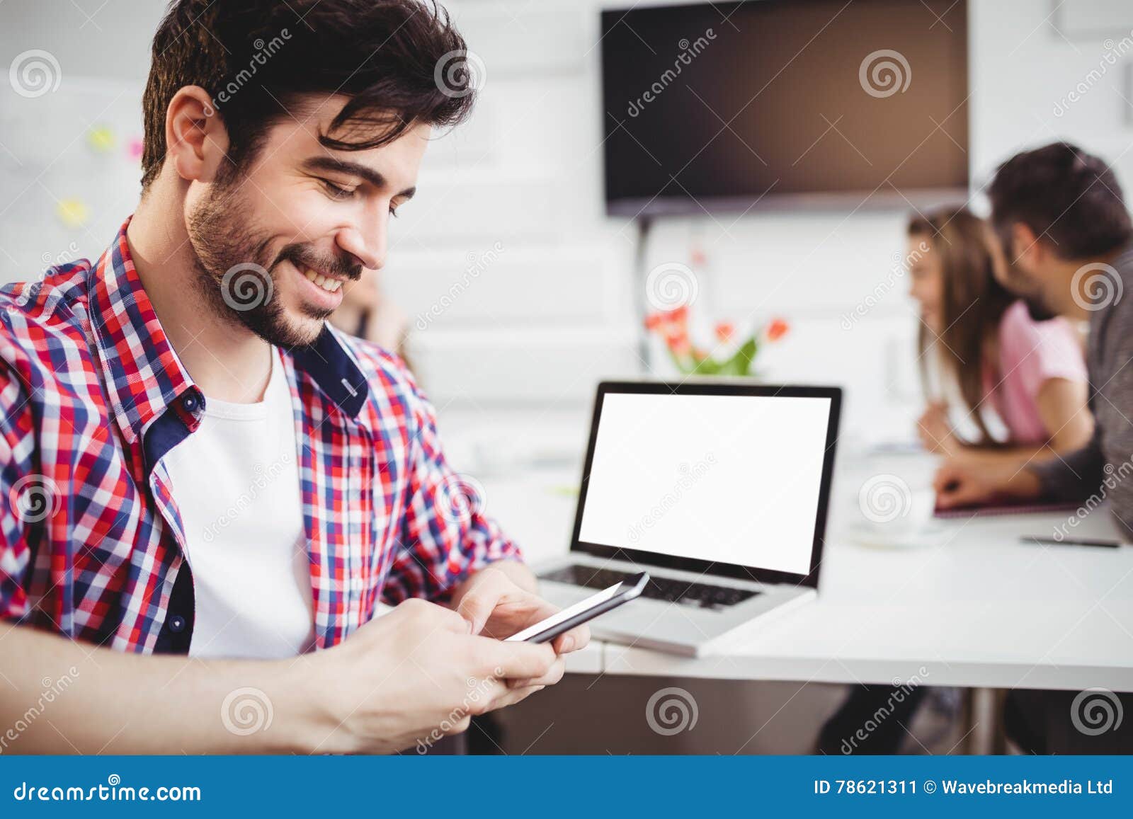 Happy Executive Texting in Meeting at Creative Office Stock Image ...