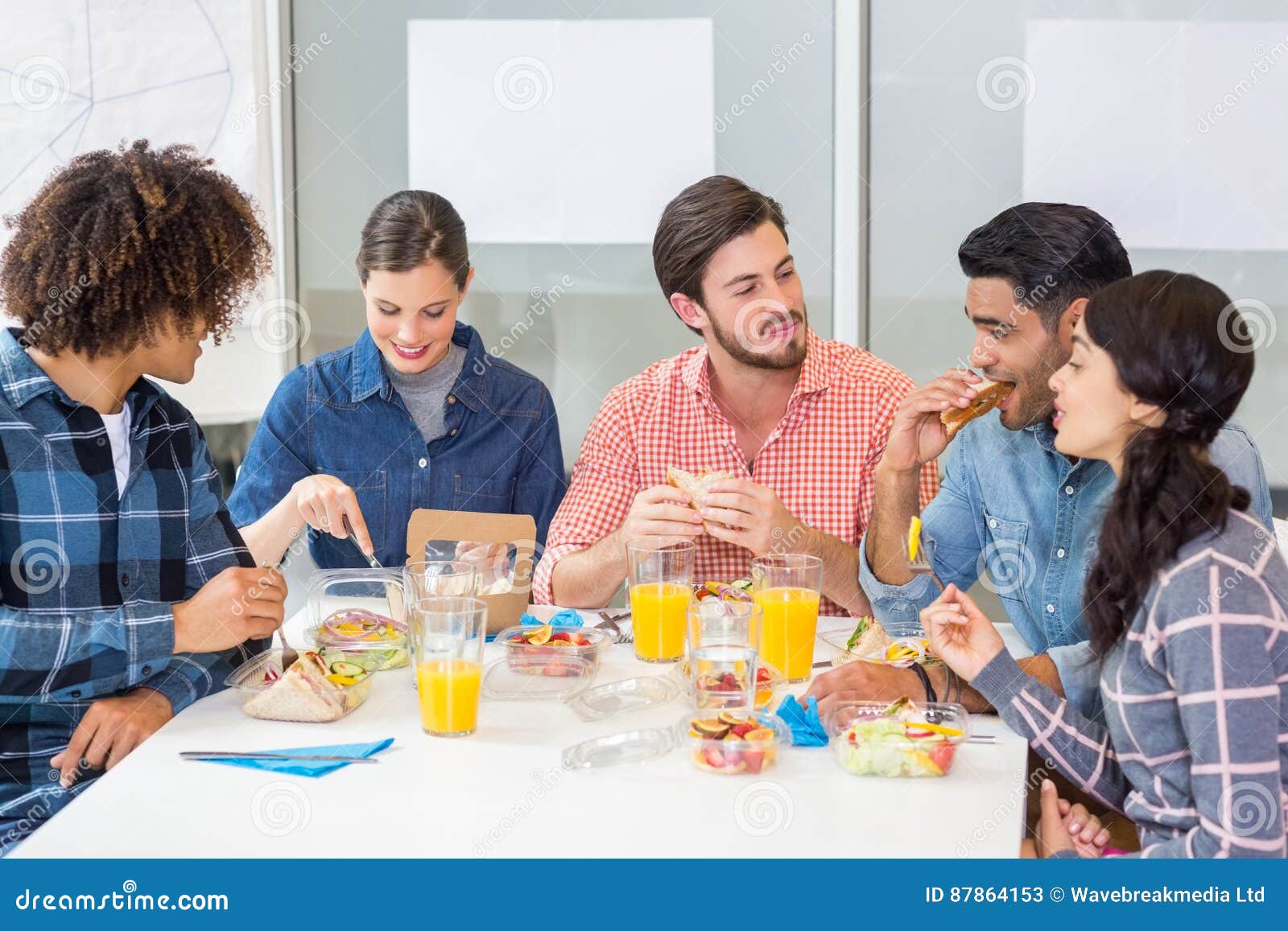 Happy Executives Interacting while Having Breakfast Stock Image - Image ...
