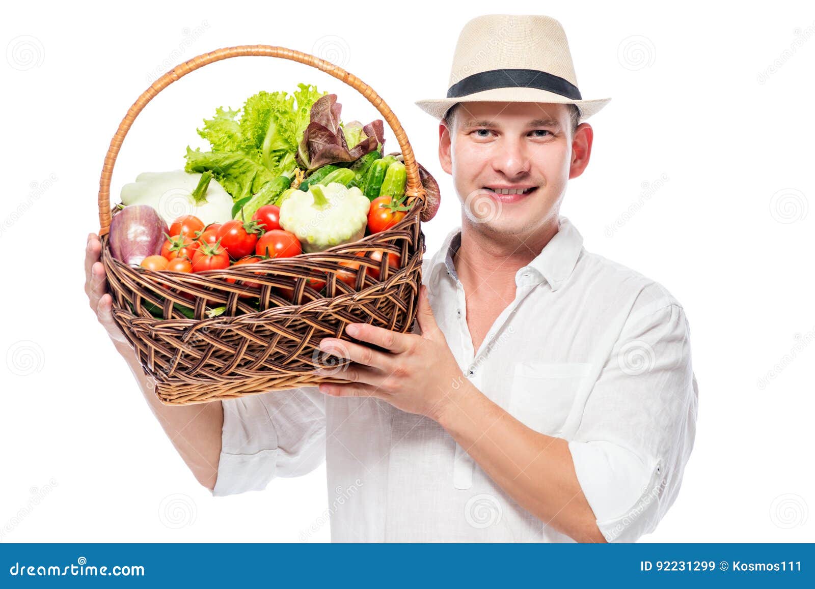 Happy Experienced Farmer with a Harvest of Vegetables in a Basket on a ...