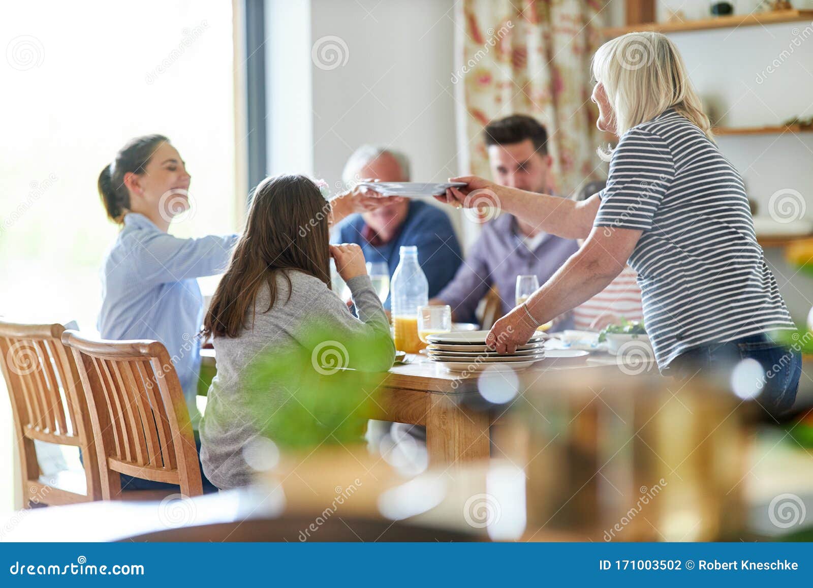 Happy Extended Family Having Lunch Stock Photo - Image of grandfather ...