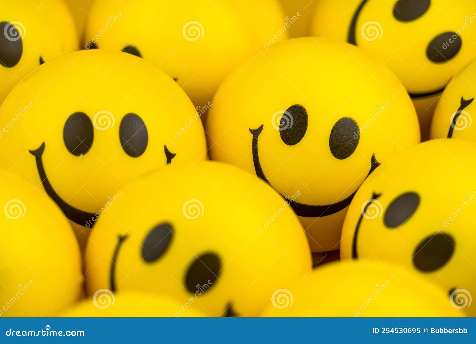 Happy Faces Ball on Yellow Background, Smiling Background Editorial ...