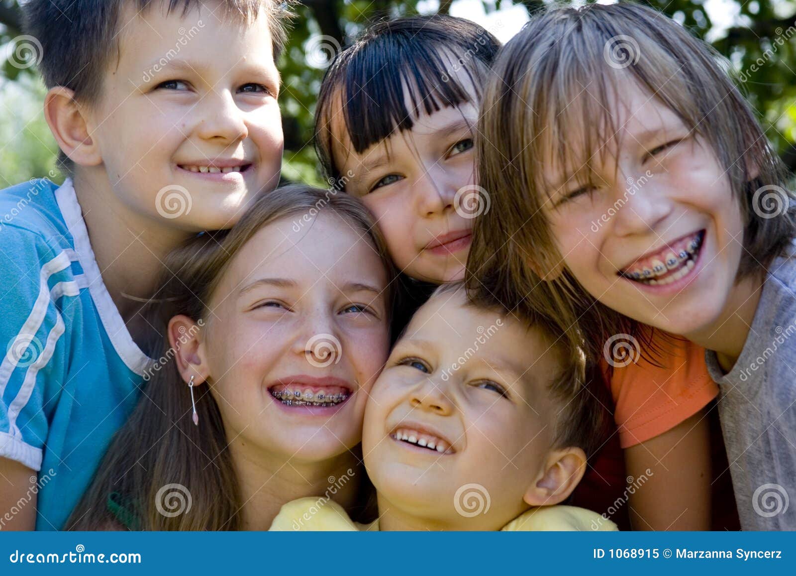Happy faces of children stock image. Image of light, kids - 1068915