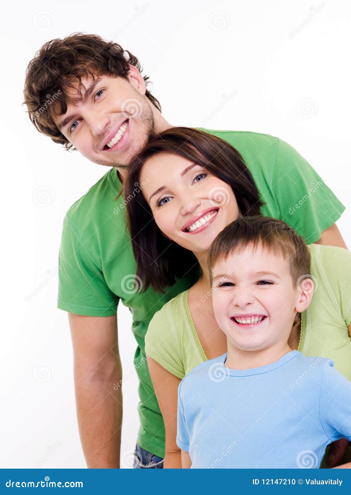 Happy Faces of an Young Family Stock Photo - Image of smile, smiling ...