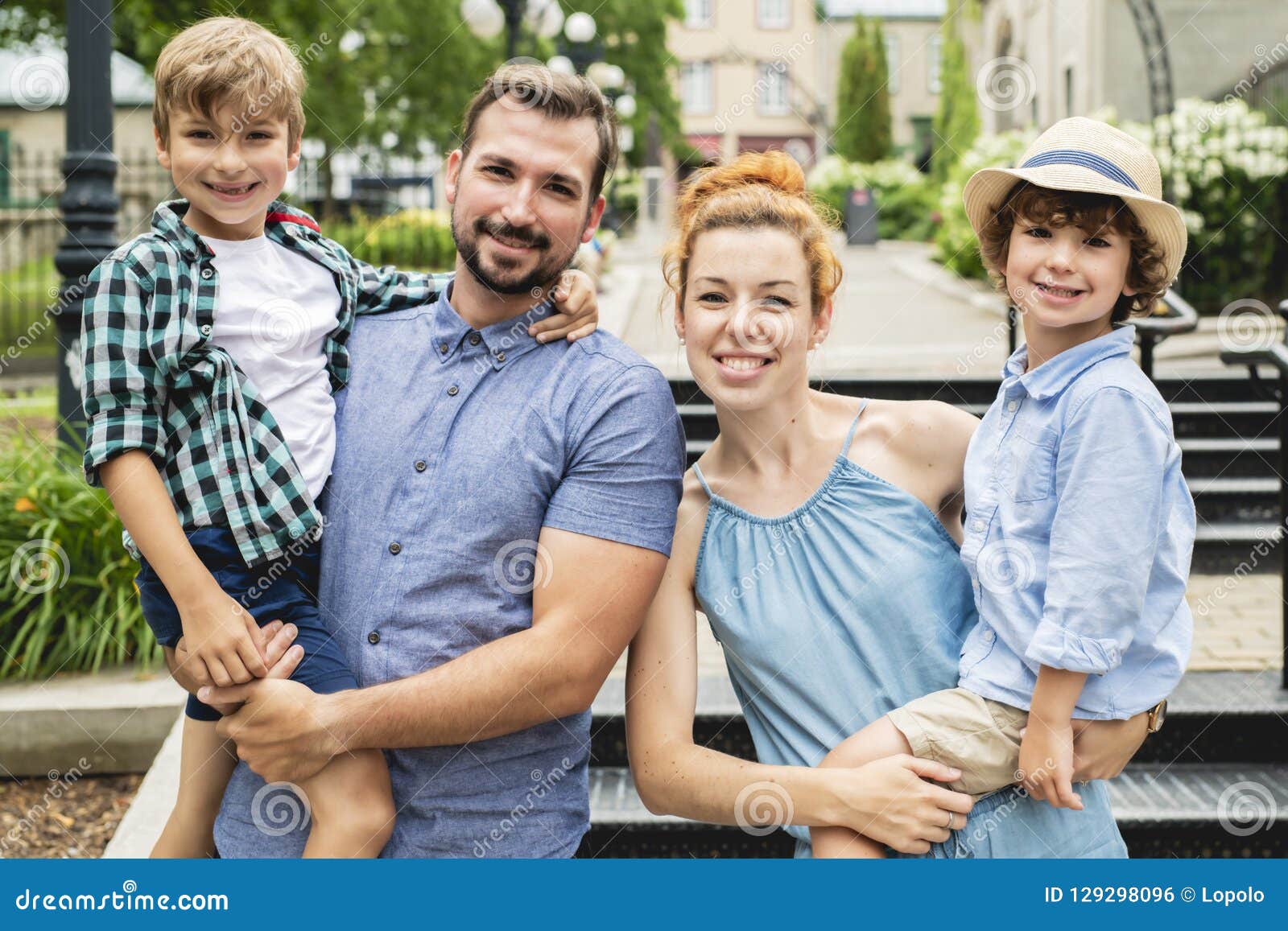 Happy Familly of Four in the Park Stock Photo - Image of female ...