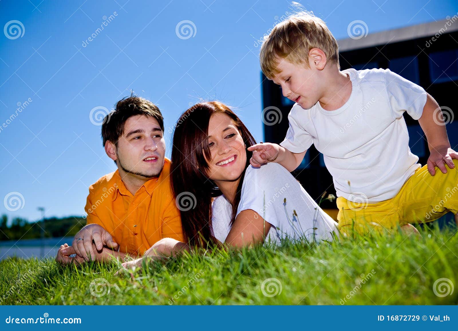 Happy family stock image. Image of outdoors, grass, laughing - 16872729