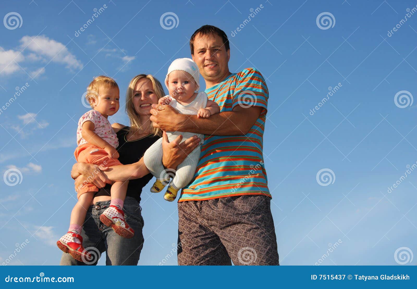 Happy Family Against the Sky Stock Image - Image of cheerful, parent ...