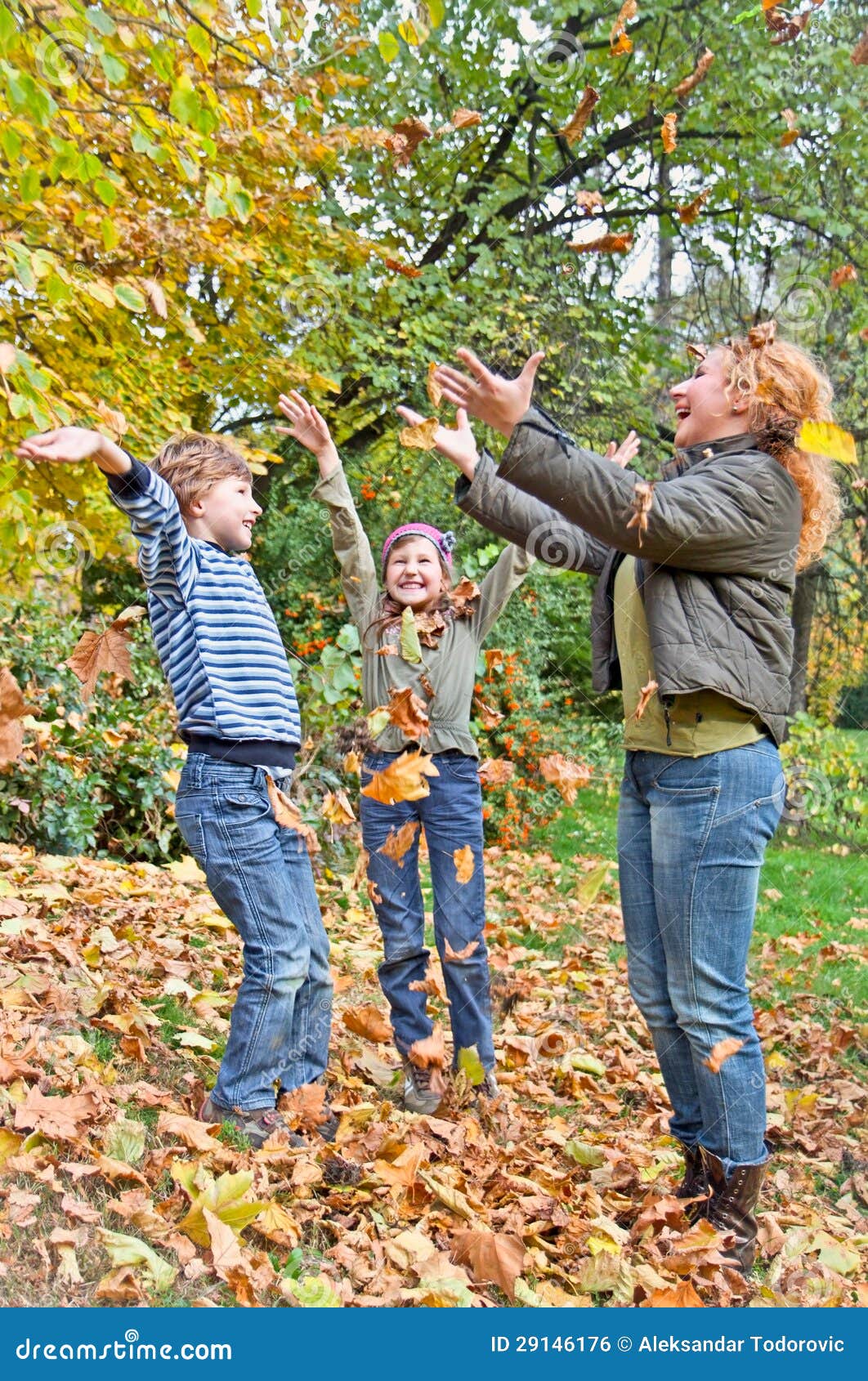 Happy Family in Autumn Forest Play with Fallen Leaf Stock Photo - Image ...