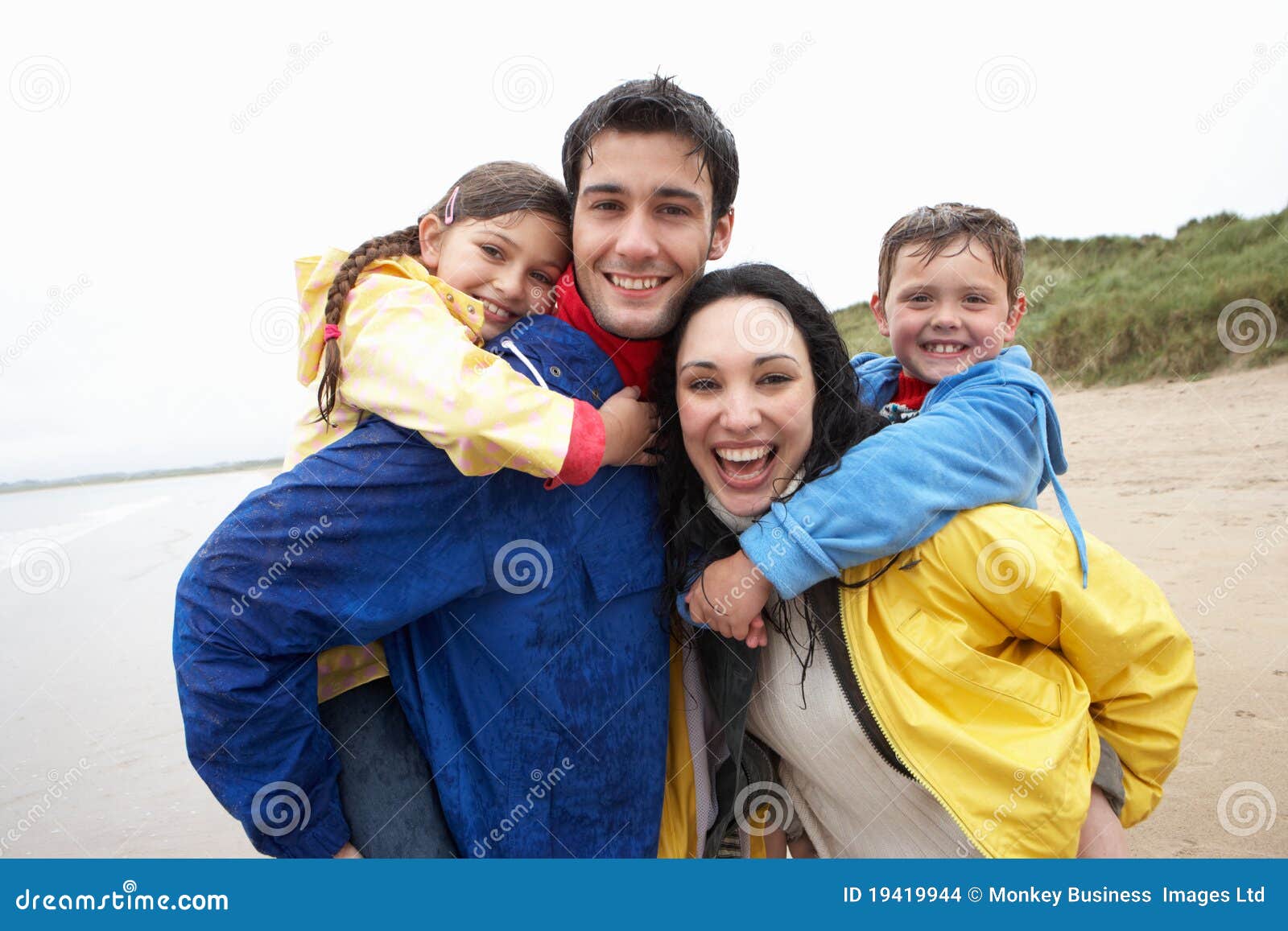 Happy family on beach stock photo. Image of caucasian - 19419944