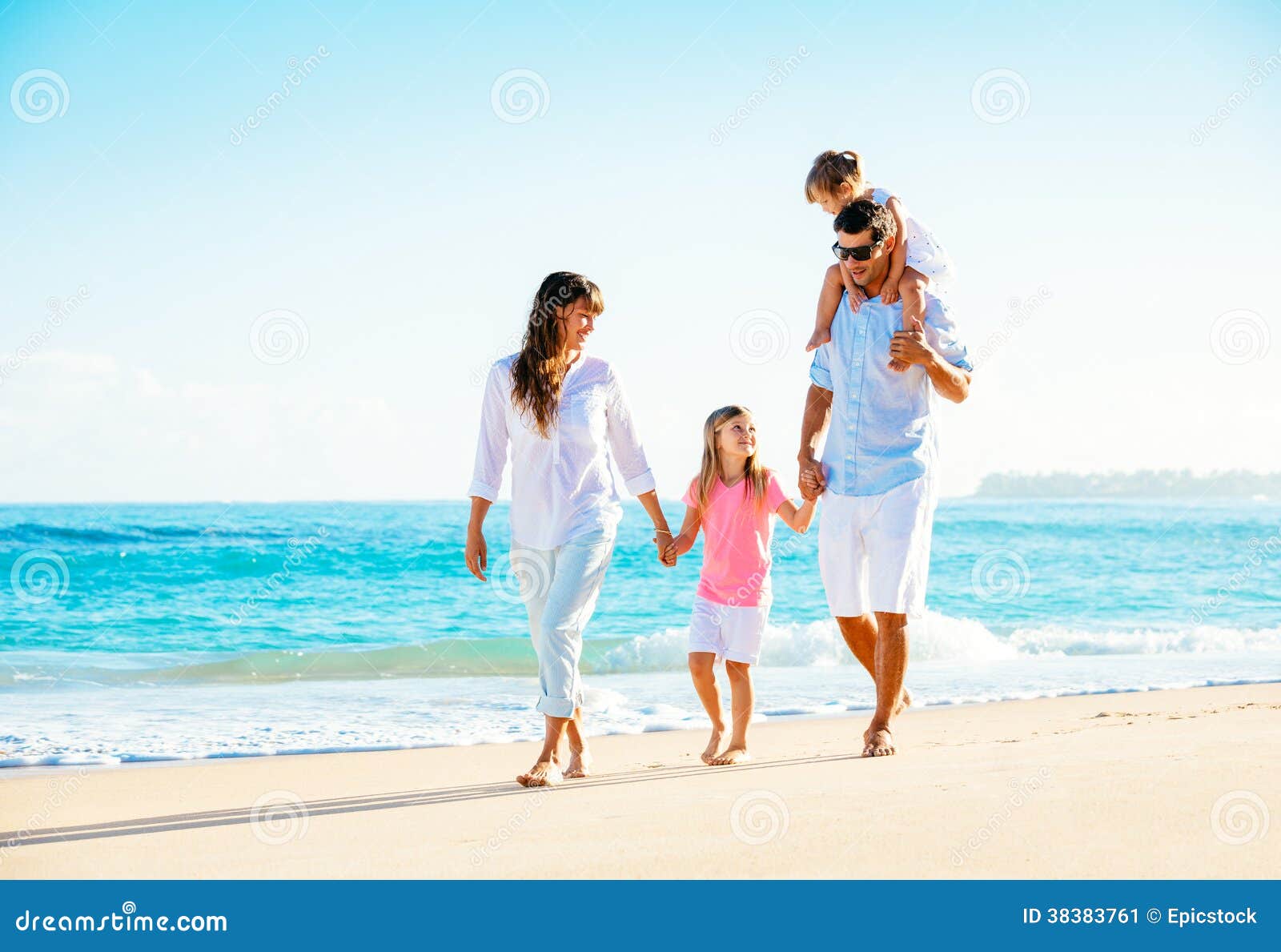Happy Family on the Beach stock image. Image of hands - 38383761