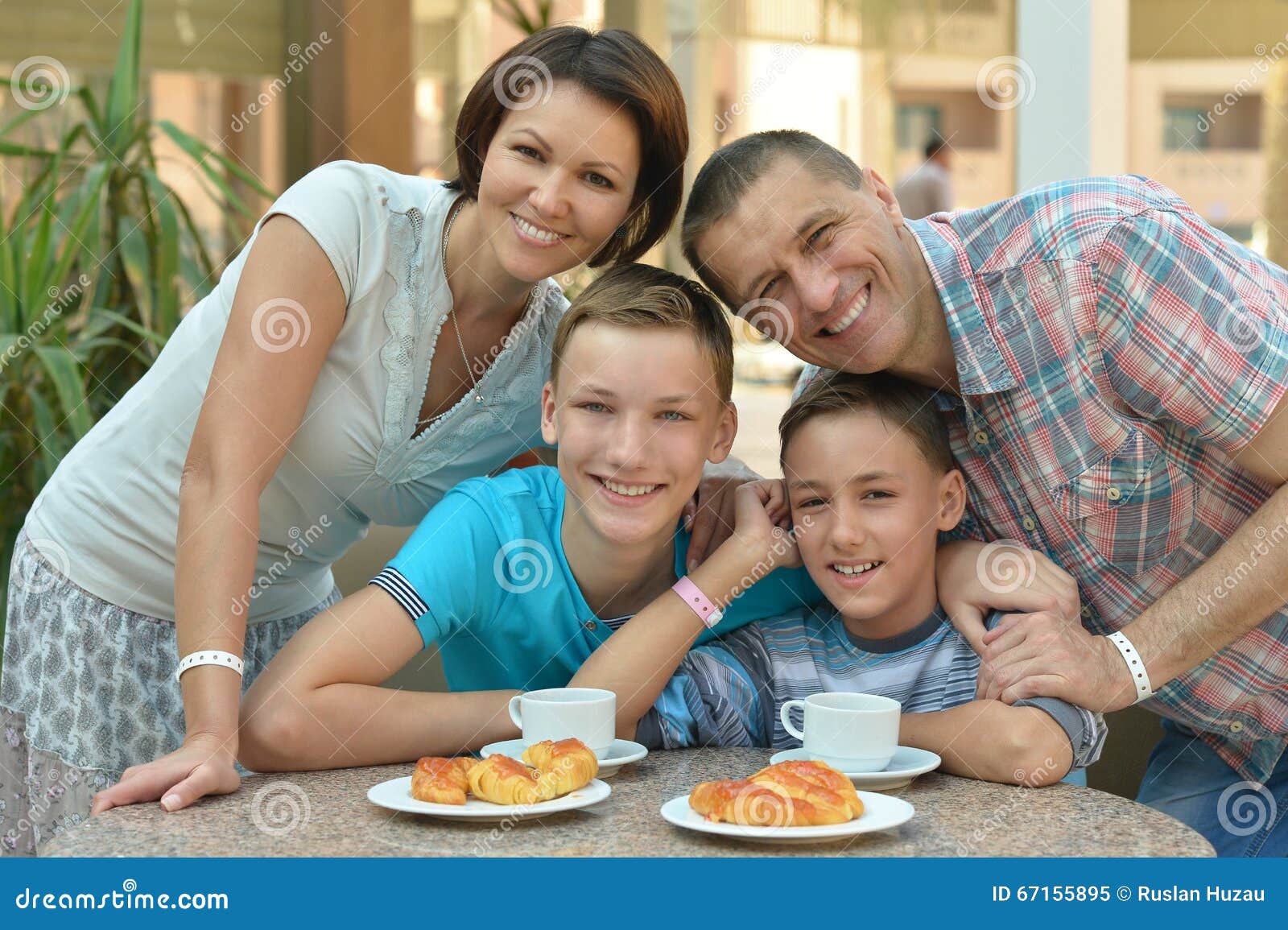 Happy family at breakfast stock image. Image of happiness - 67155895