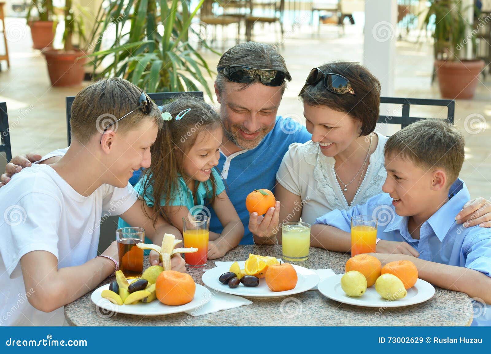 Happy family at breakfast stock image. Image of comfort - 73002629