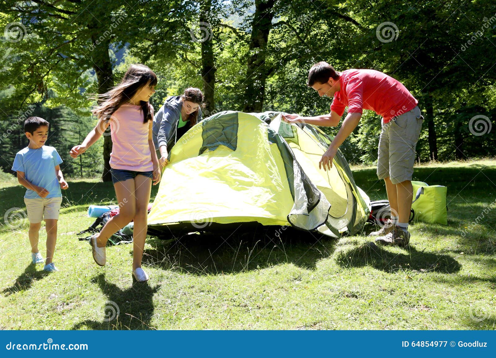 Happy Family Camping in Forest Stock Image - Image of people ...