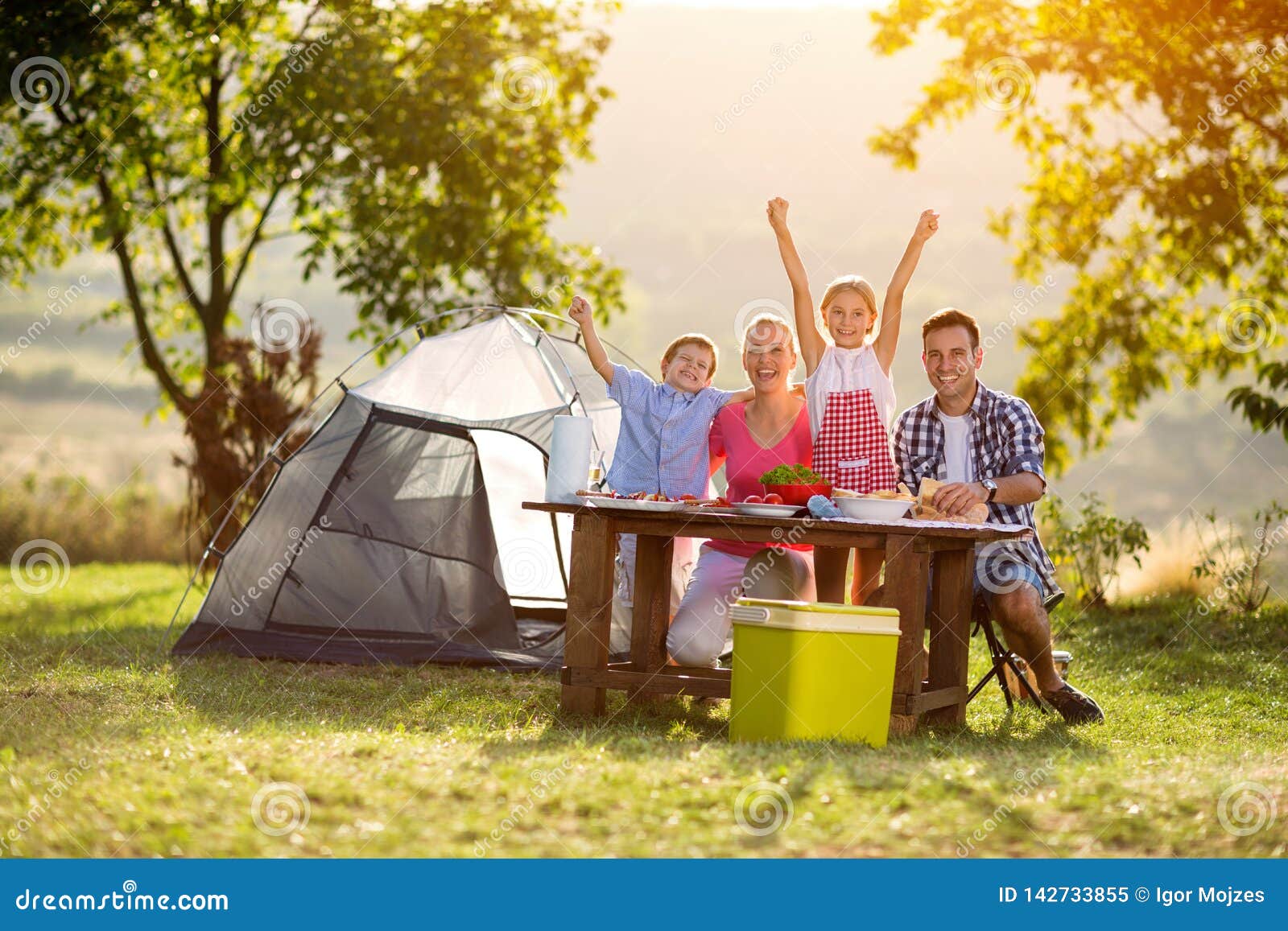 Happy family on camping stock image. Image of parent - 142733855